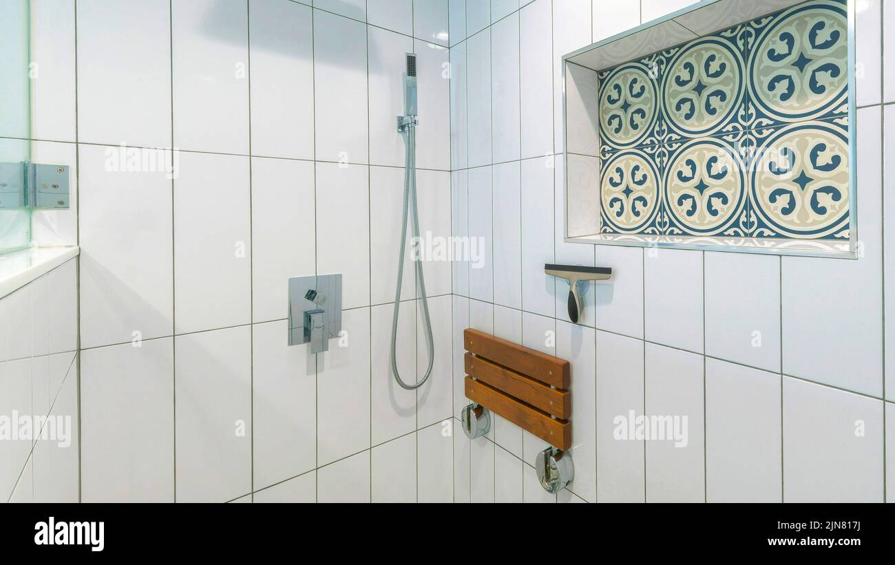 Panorama Shower stall interior with white ceramic tiles surround and ...