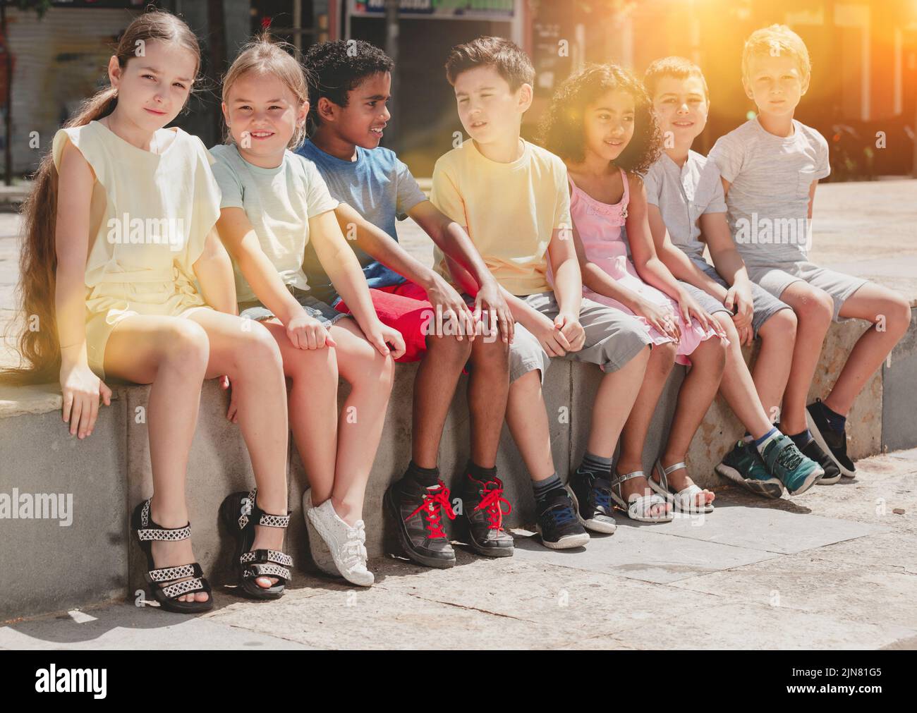 Company of children are communicating on walk in the street Stock Photo ...