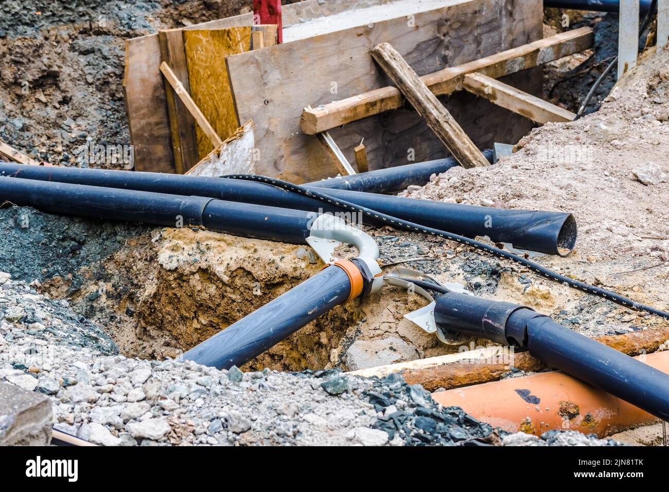 Civil engineering works with pipes in detail surround soil and gravel ...