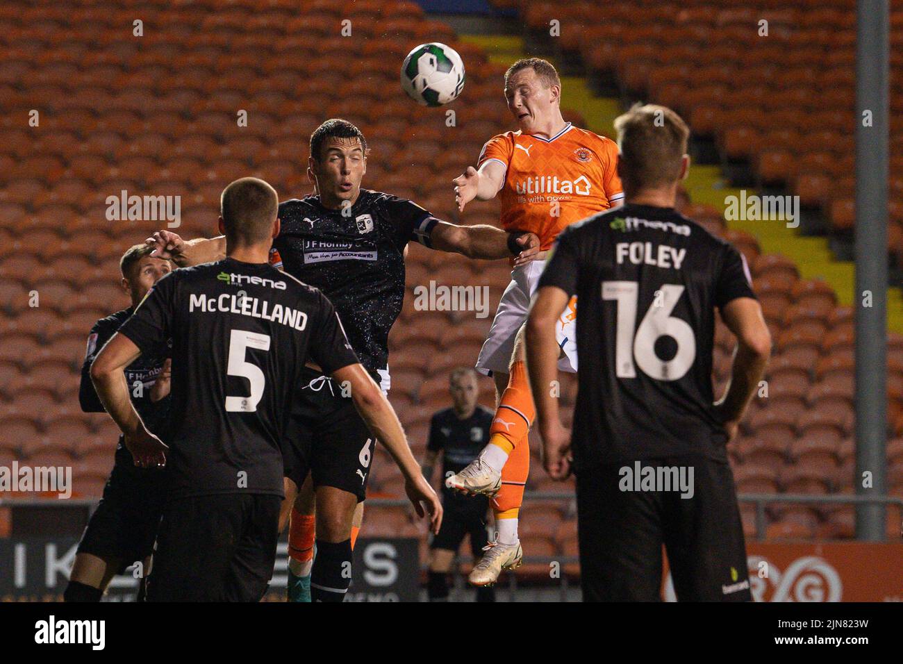 Shayne Lavery #19 of Blackpool wins the header Stock Photo - Alamy