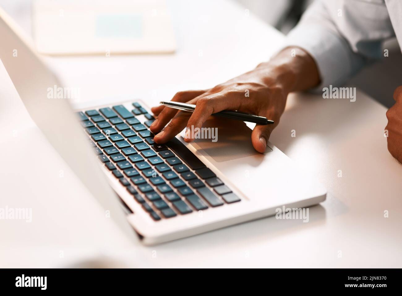 Theres always work to be done. an unrecognizable businessman working on ...