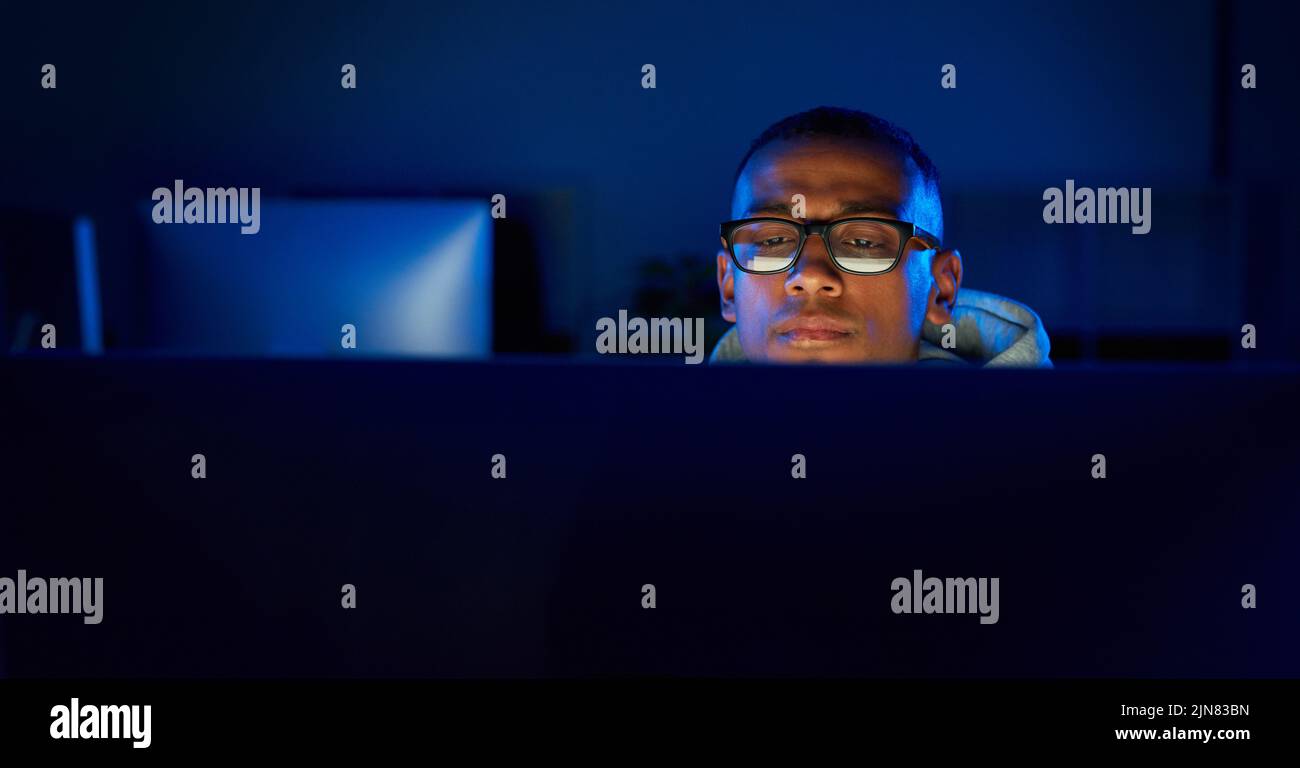 That looks pretty interesting. a young male hacker cracking a computer ...