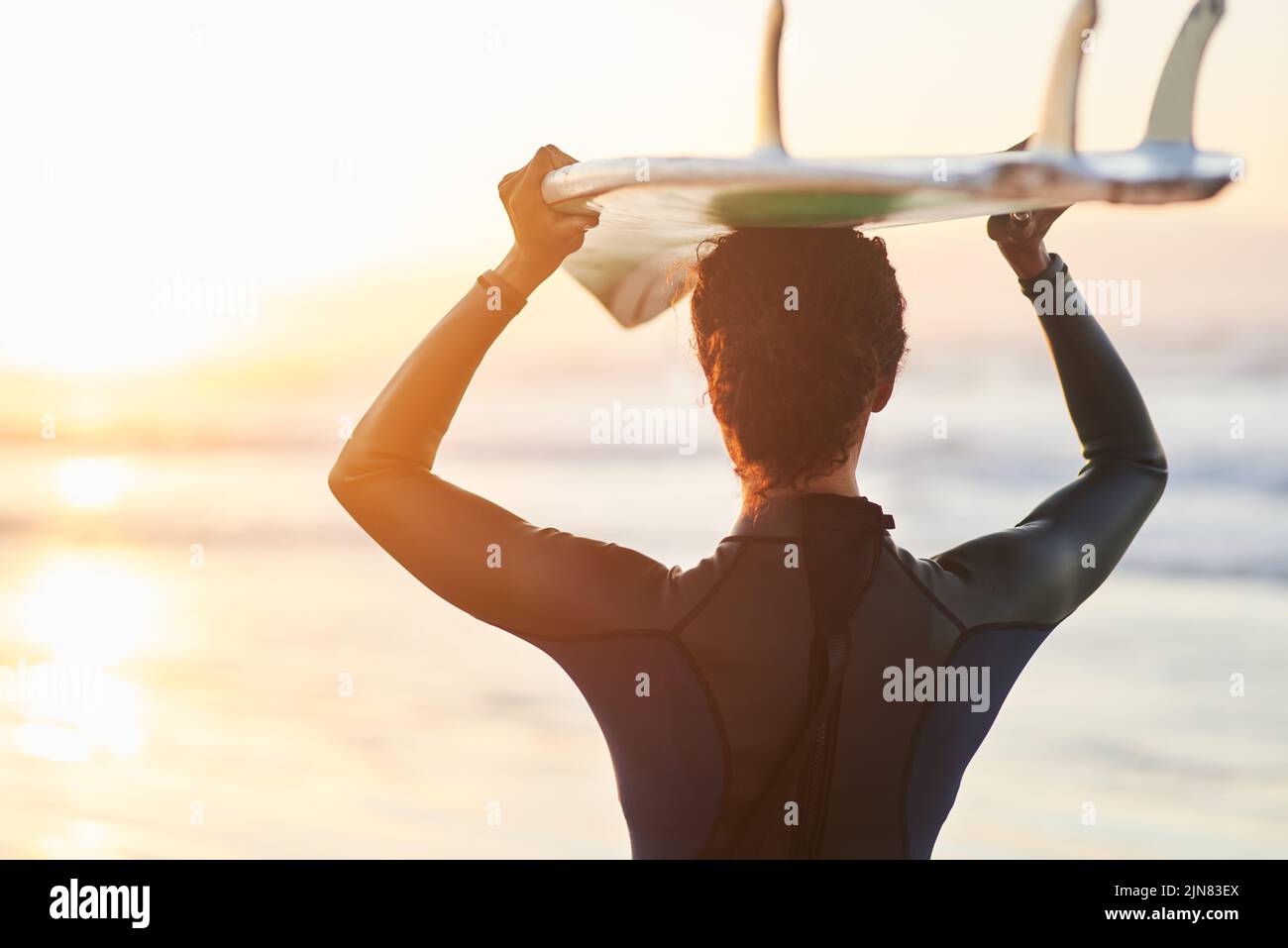 Female running into sea rear view hi-res stock photography and images ...