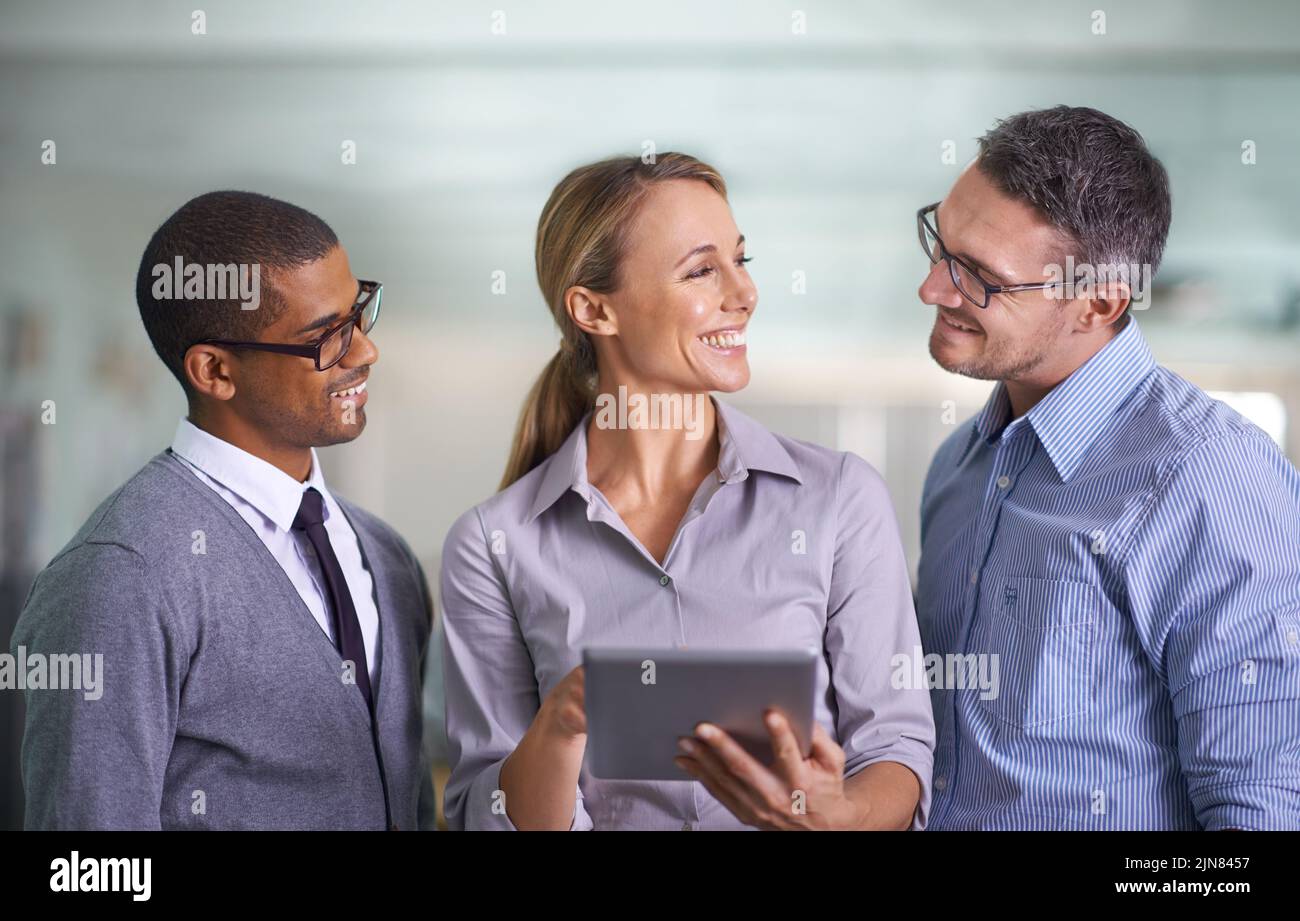 Happy, smiling and confident business woman with her team happy about a teamwork proposal ...