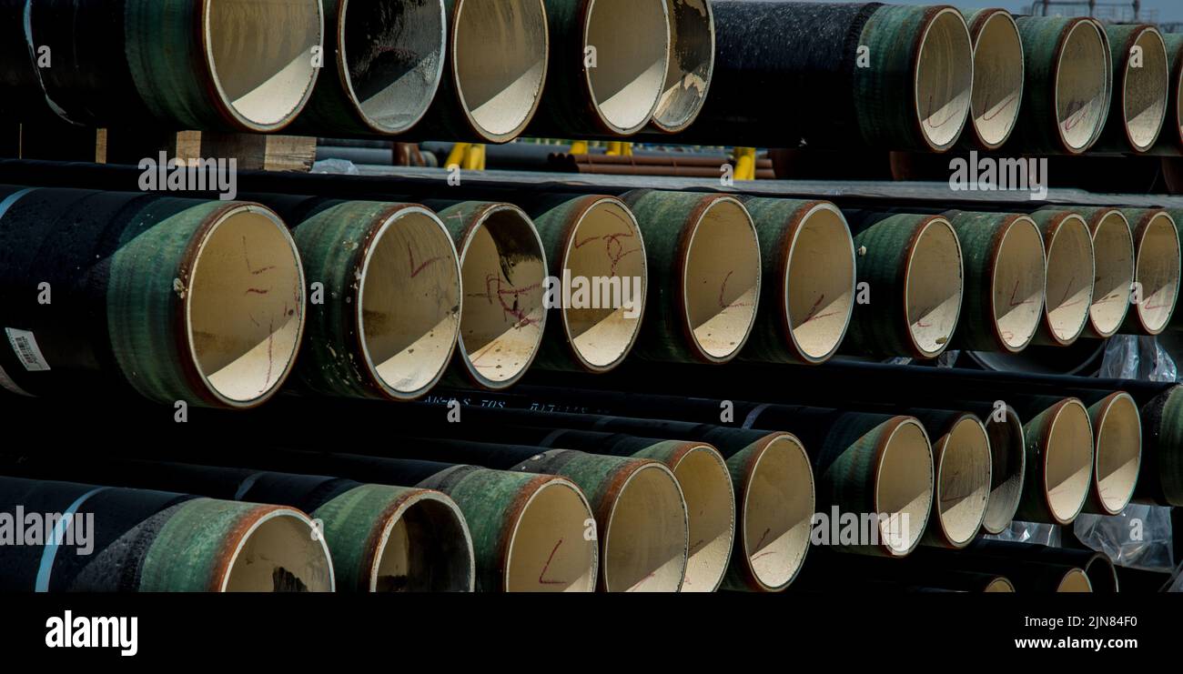 Stack of large diameter metal pipes Stock Photo - Alamy