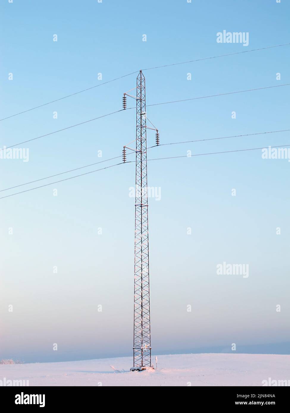 A photo of electricity lines in winter landscape Stock Photo - Alamy