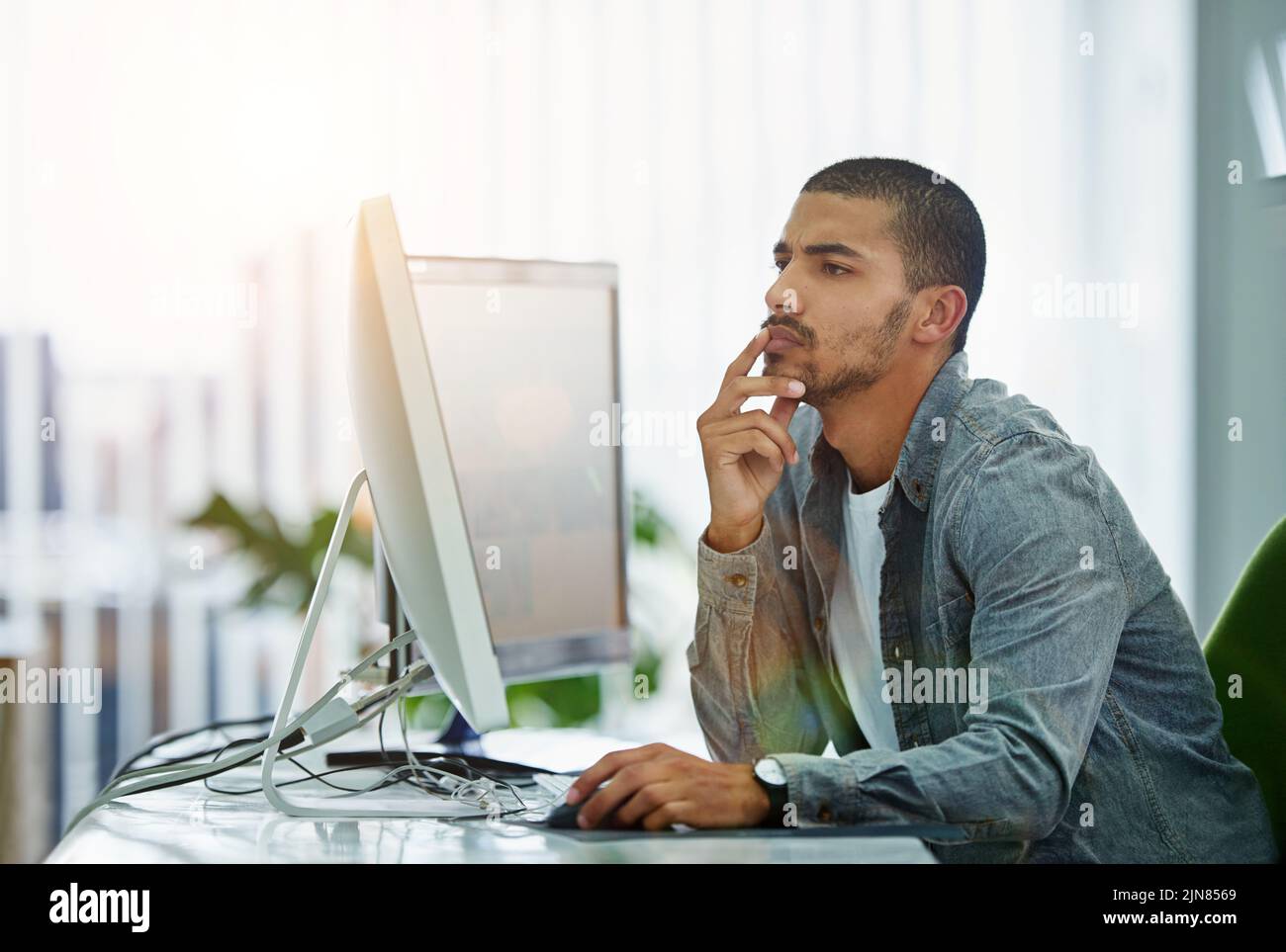 Man thinking computer ethnic hi-res stock photography and images - Alamy