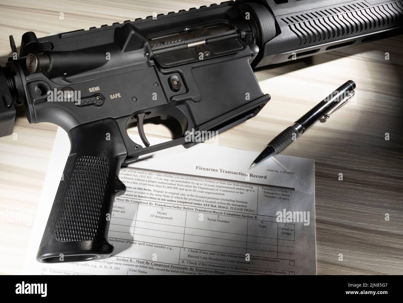 Modern sporting rifle and background check form for its purchase Stock ...