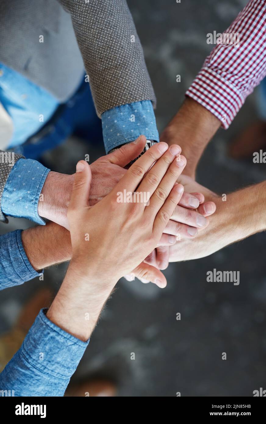 Support, teamwork and community by hands joining together during team ...