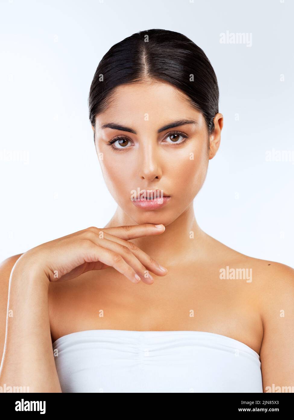 Attention grabbing beauty. Studio shot of beautiful young women posing ...