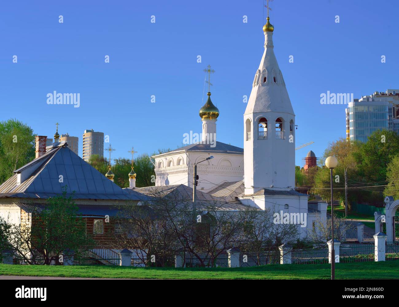 White Stone Church of the Resurrection of Christ. Bell tower among the ...
