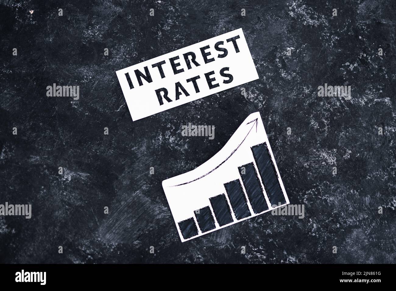interest rates text and graph showing stats going up, concept of the ...