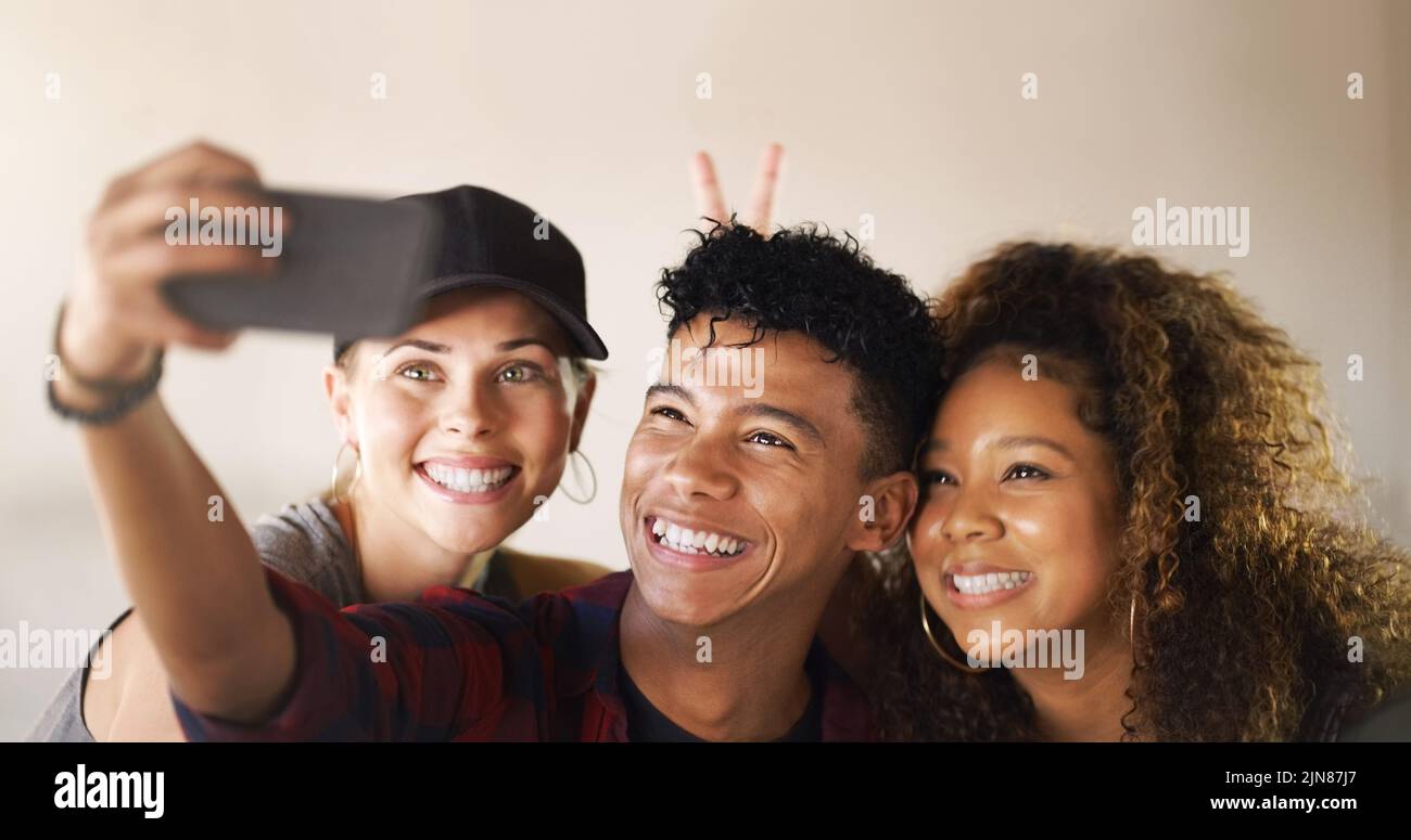 But first, lemme take a selfie. a young diverse group of dancers ...