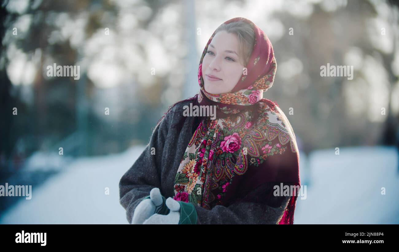 Russian folklore - beautiful russian woman in a scarf is clapping her ...
