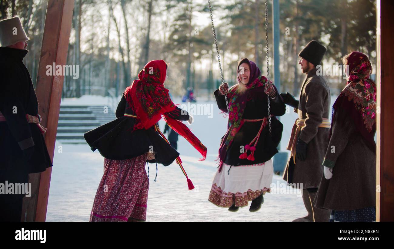 Russian folklore - Russian woman swinging and everyone is laughing on a ...