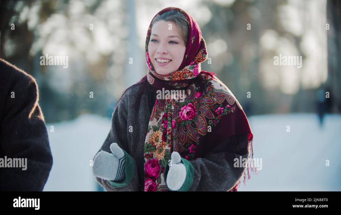 Russian folklore - beautiful russian woman in a scarf is clapping her ...