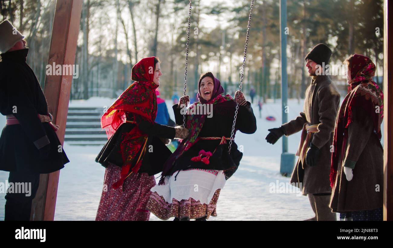 Russian folklore - Russian girl swinging and everyone is laughing on a ...