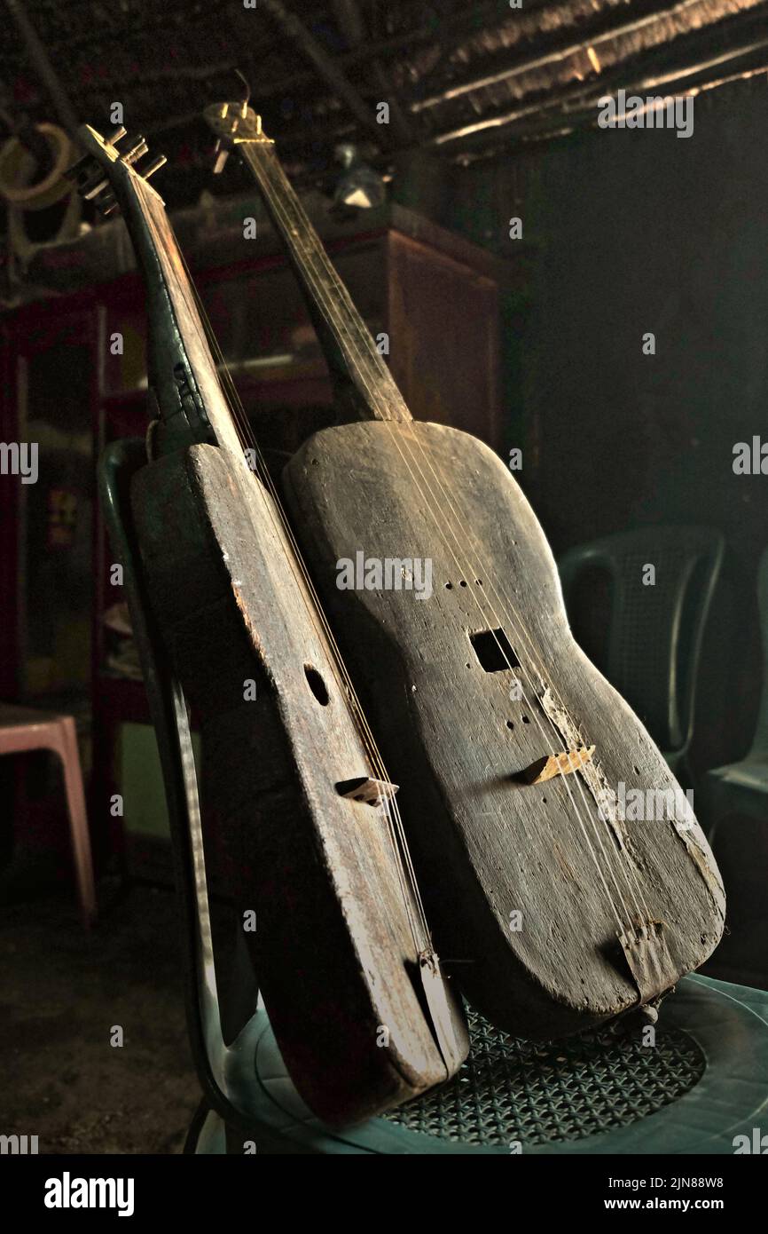 Traditional guitar-like stringed instruments in Fatumnasi village ...