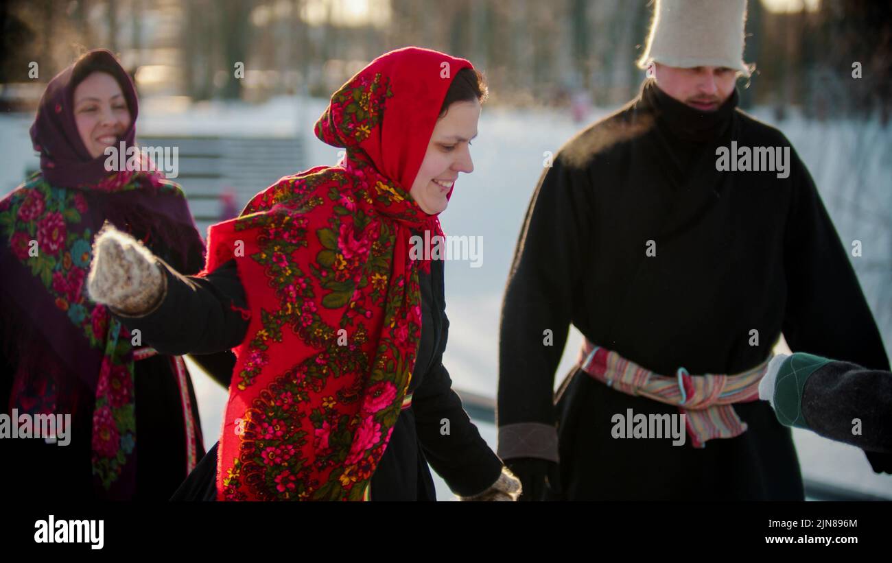 Russian folklore - russian young people dancing outdoors at winter ...