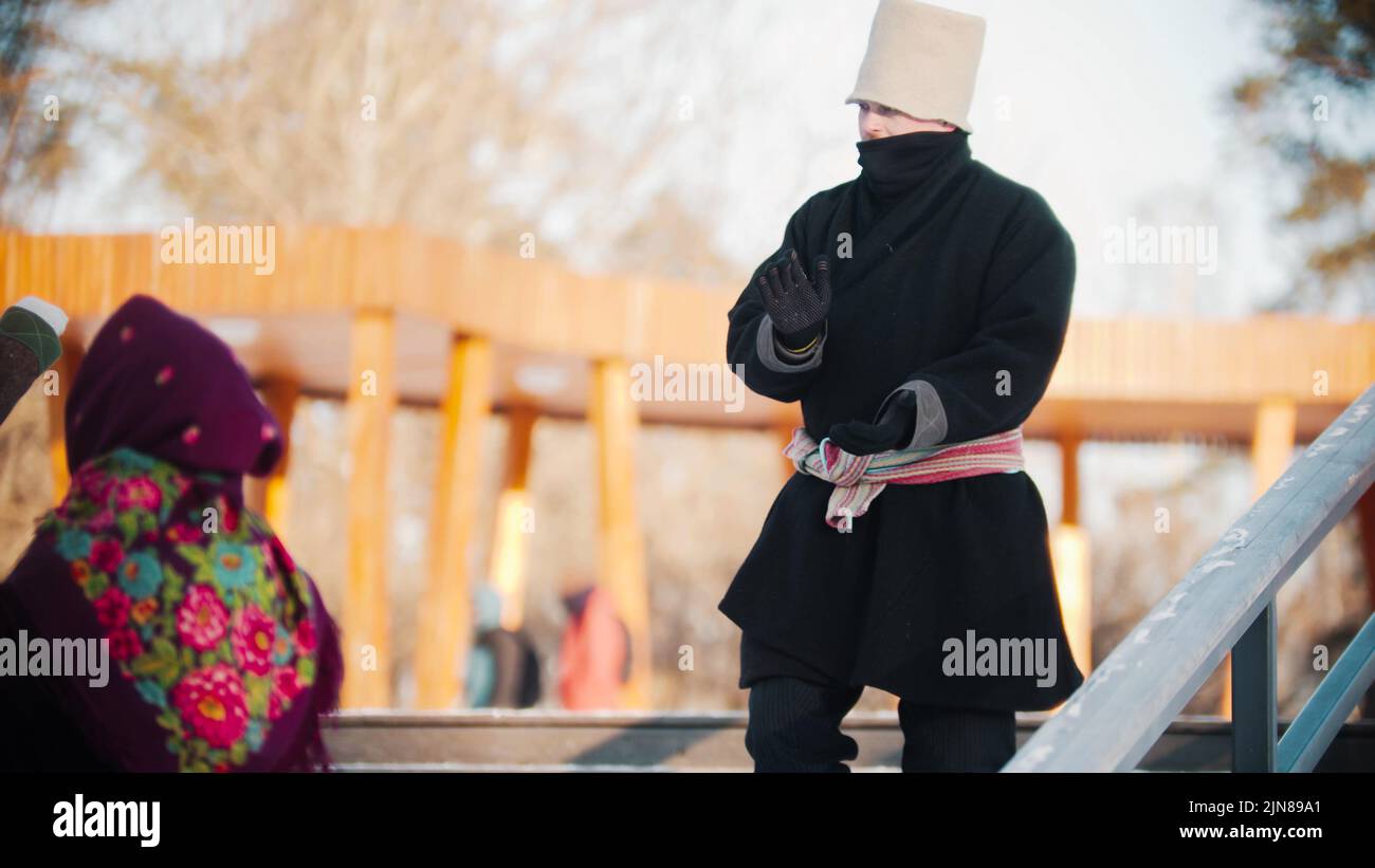 Russian folklore - man dancing on the stairs and clapping with his ...