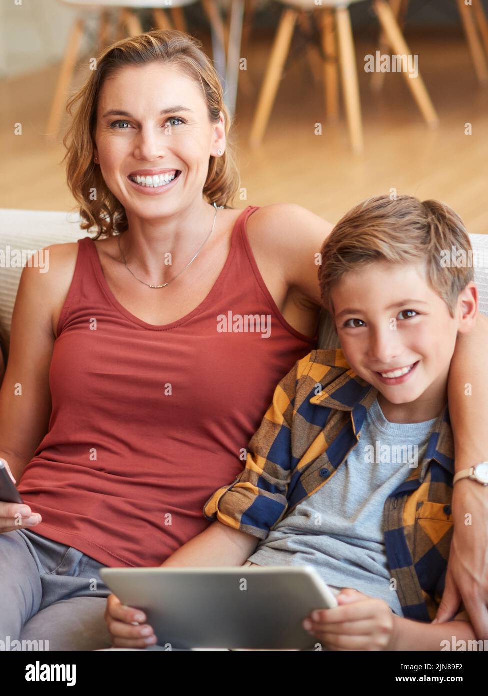 Teaching my sone safe internet habits. an adorable little boy using a ...