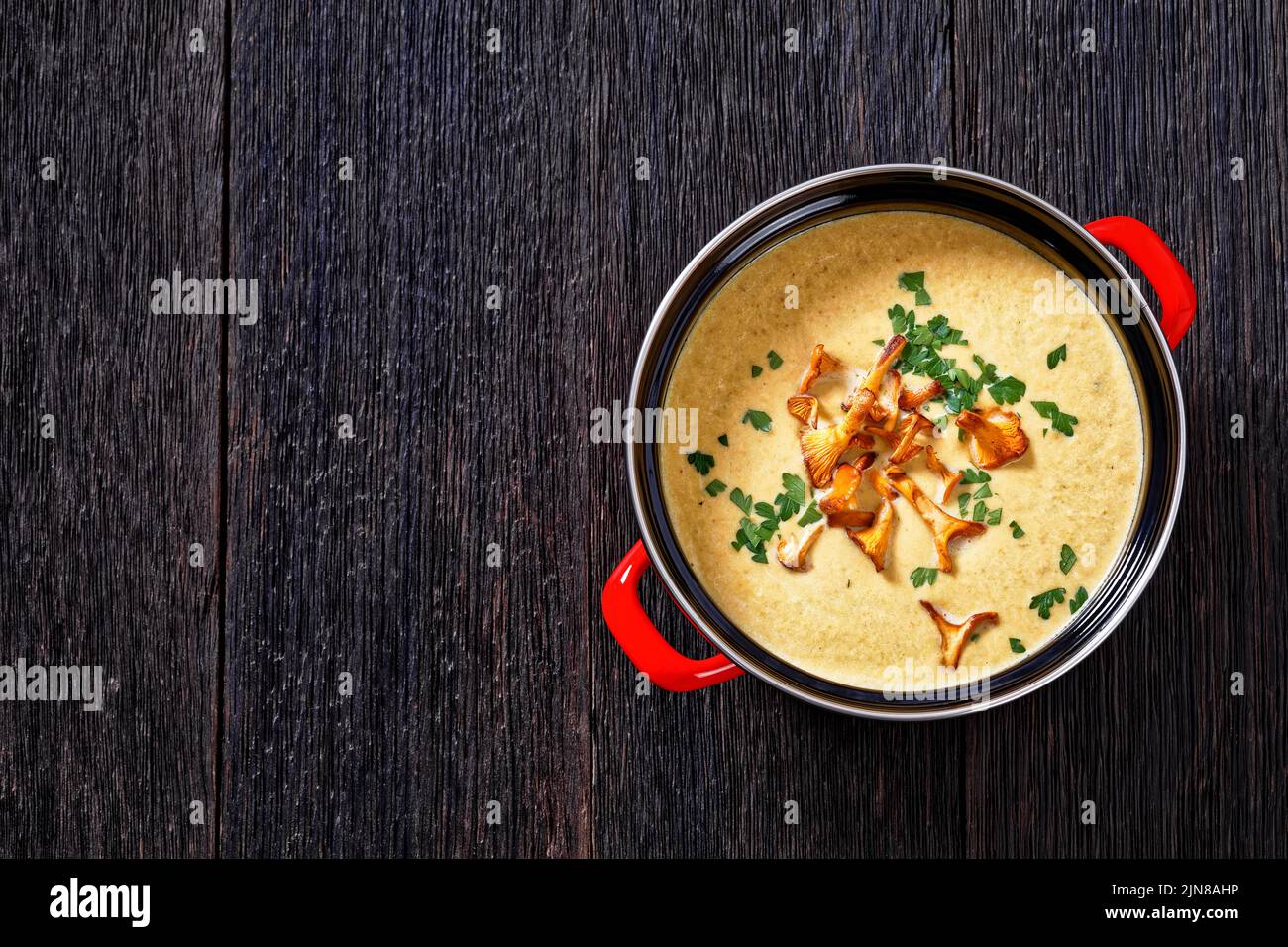 Kanttarellikeitto, Finnish Chanterelle Soup in red pot on dark wooden ...