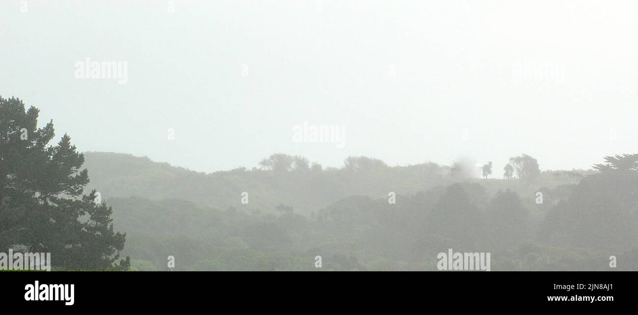 Farm landscape in rain Stock Photo - Alamy