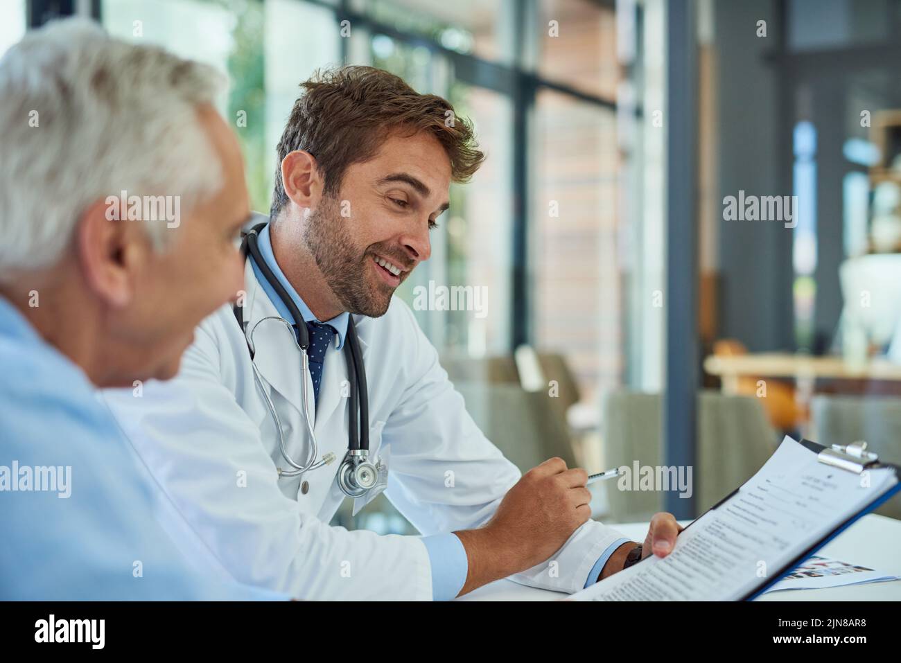 The results show that hes in excellent health. a handsome doctor going ...