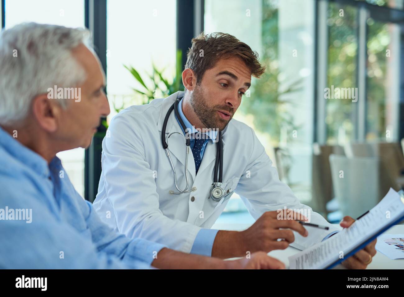 Good doctors help you make the best health choices. a handsome doctor ...