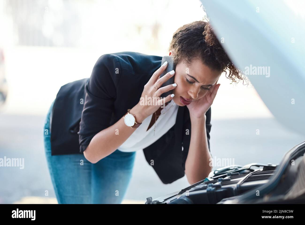 I need someone over here immediately. an attractive young businesswoman ...