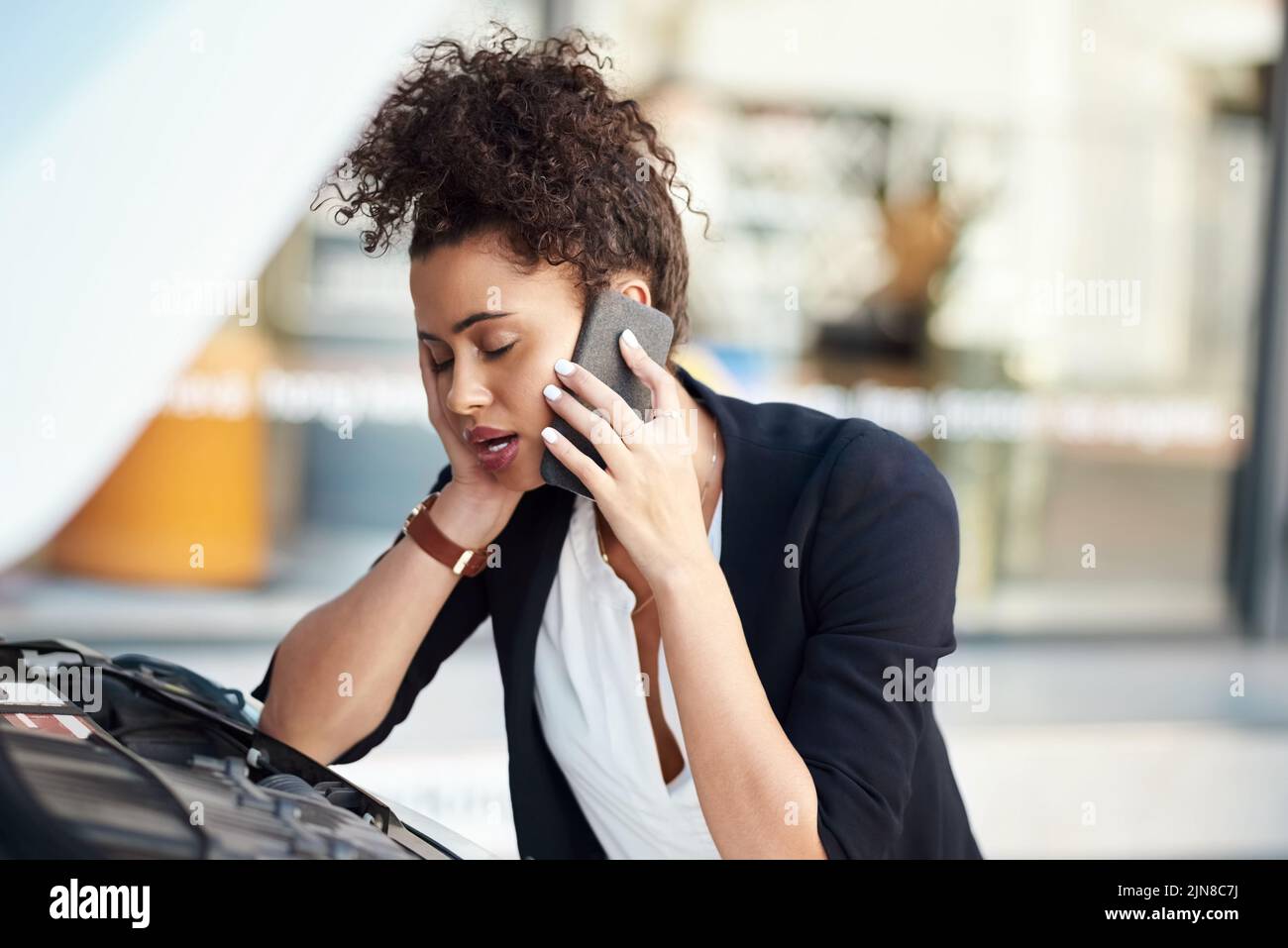 Car troubles will frustrate you in a minute. a frustrated young ...