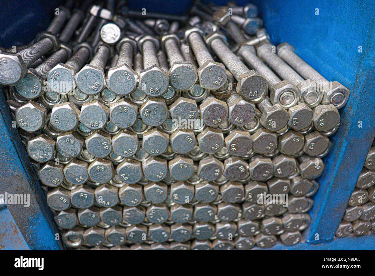iron made nut and bolt stock on shop for sell Stock Photo - Alamy