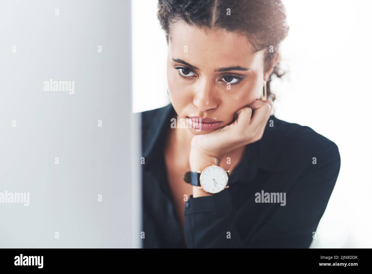 Her productivity has been killed. a young businesswoman looking bored ...