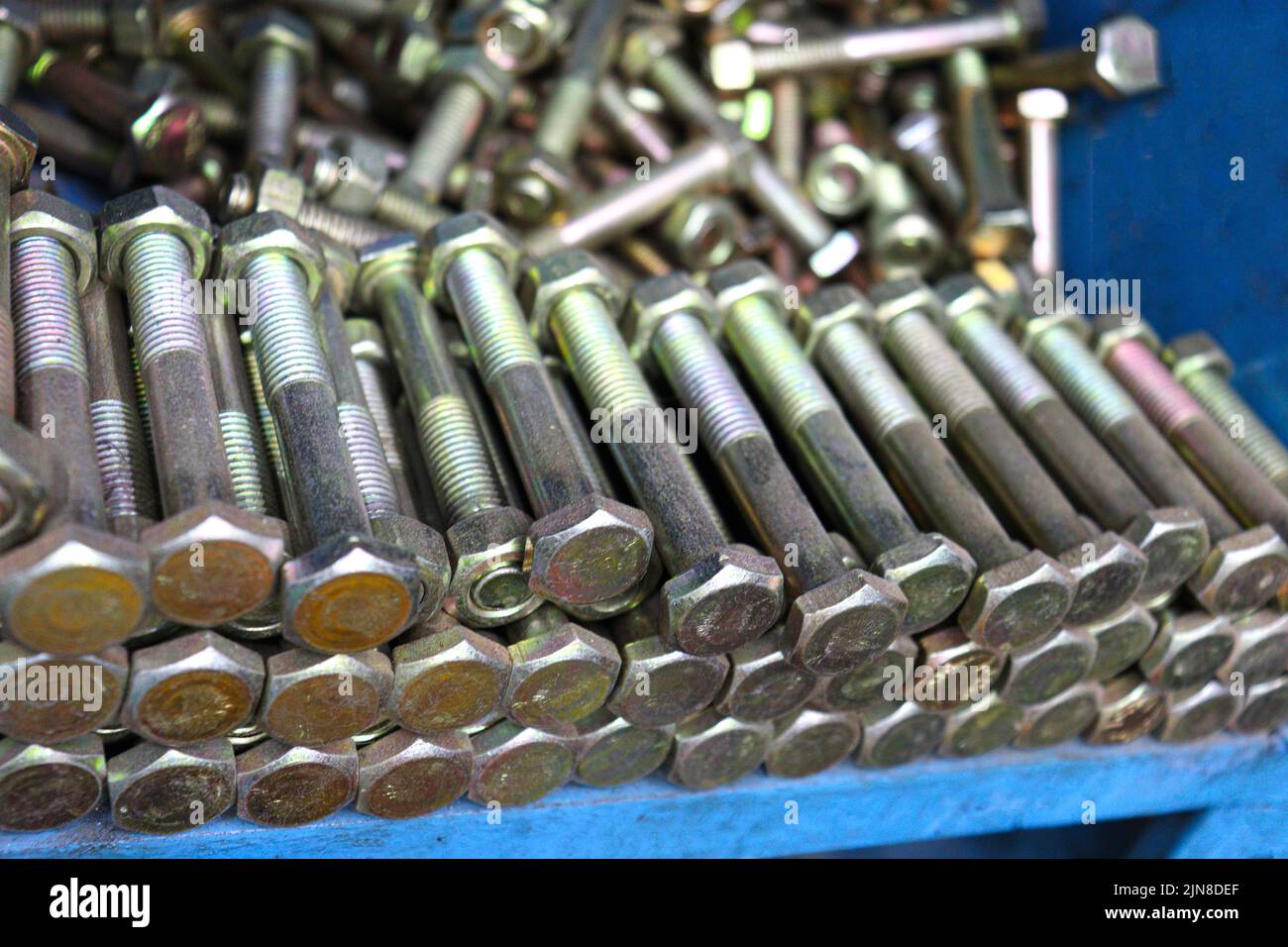 iron made nut and bolt stock on shop for sell Stock Photo - Alamy