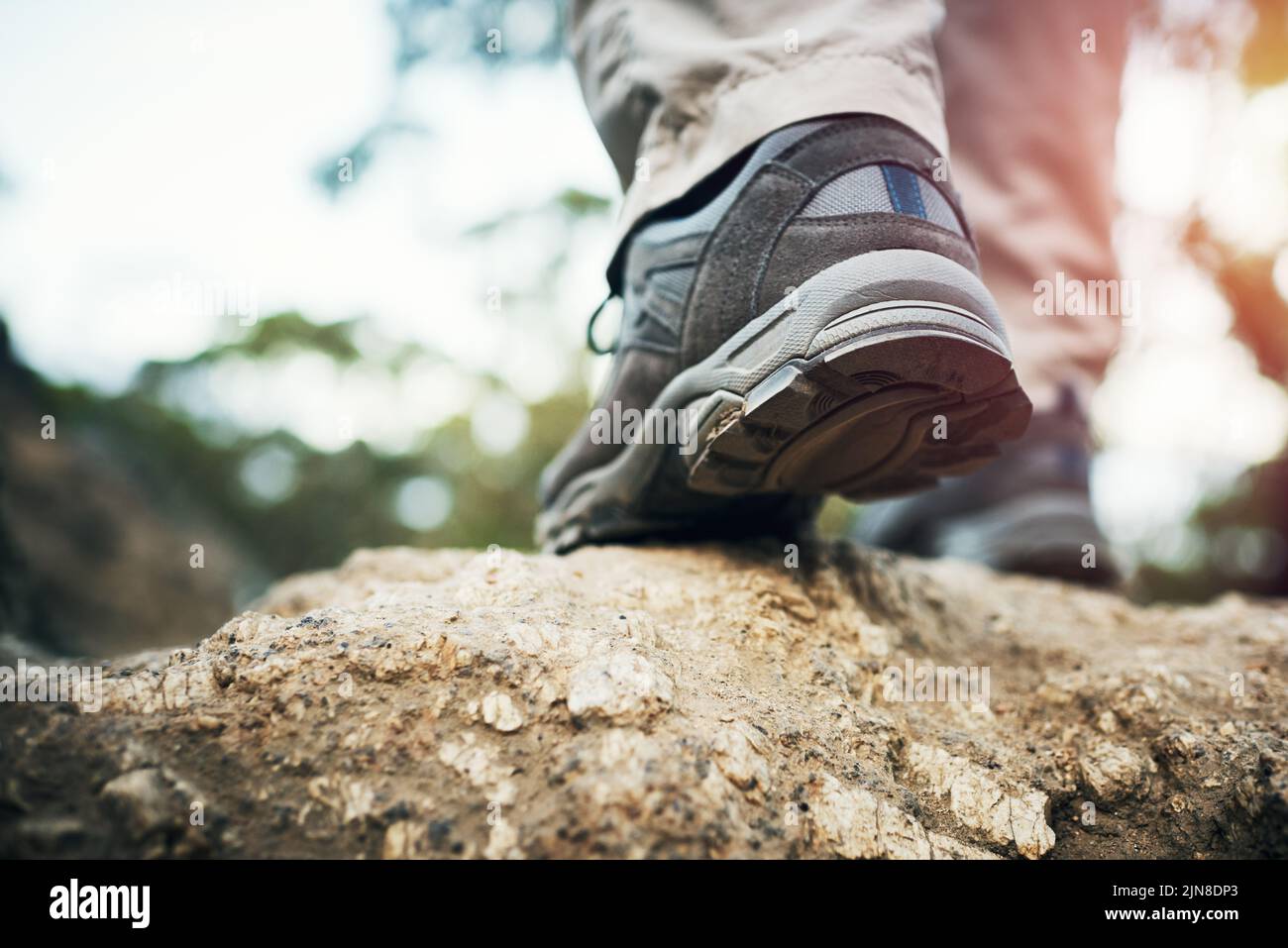 It just takes one step. Low angle shot of an unrecognizable man walking ...