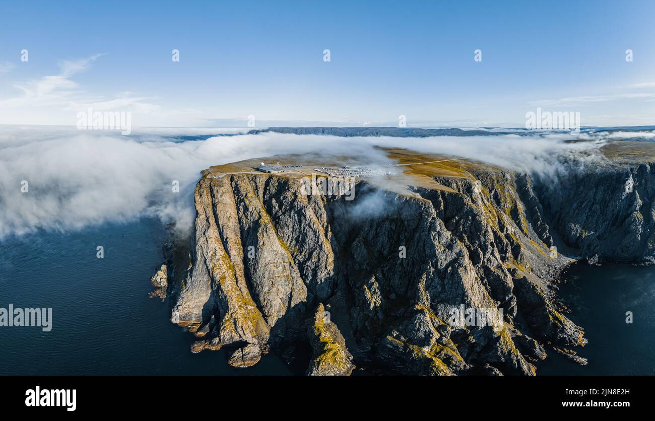 Aerial view of North Cape aka Nordkapp in summer with fog clouds over ...