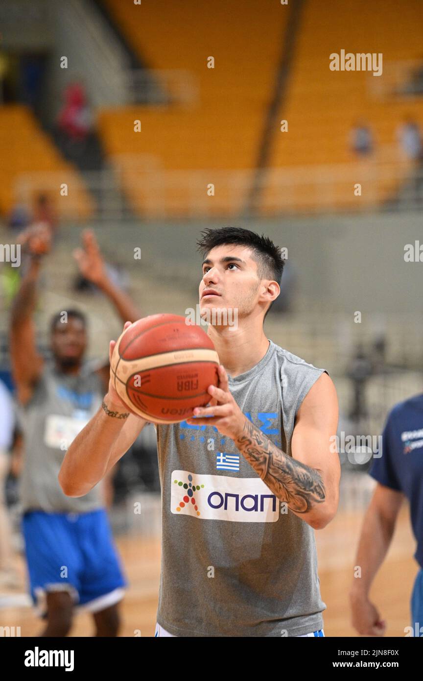 PANAGIOTIS KALAITZAKIS #11 of Greek Basketball Team react during the ...