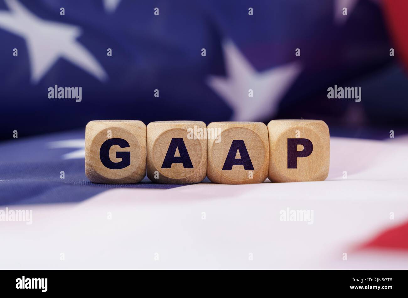 American economy and business concept. The US flag has cubes with the ...