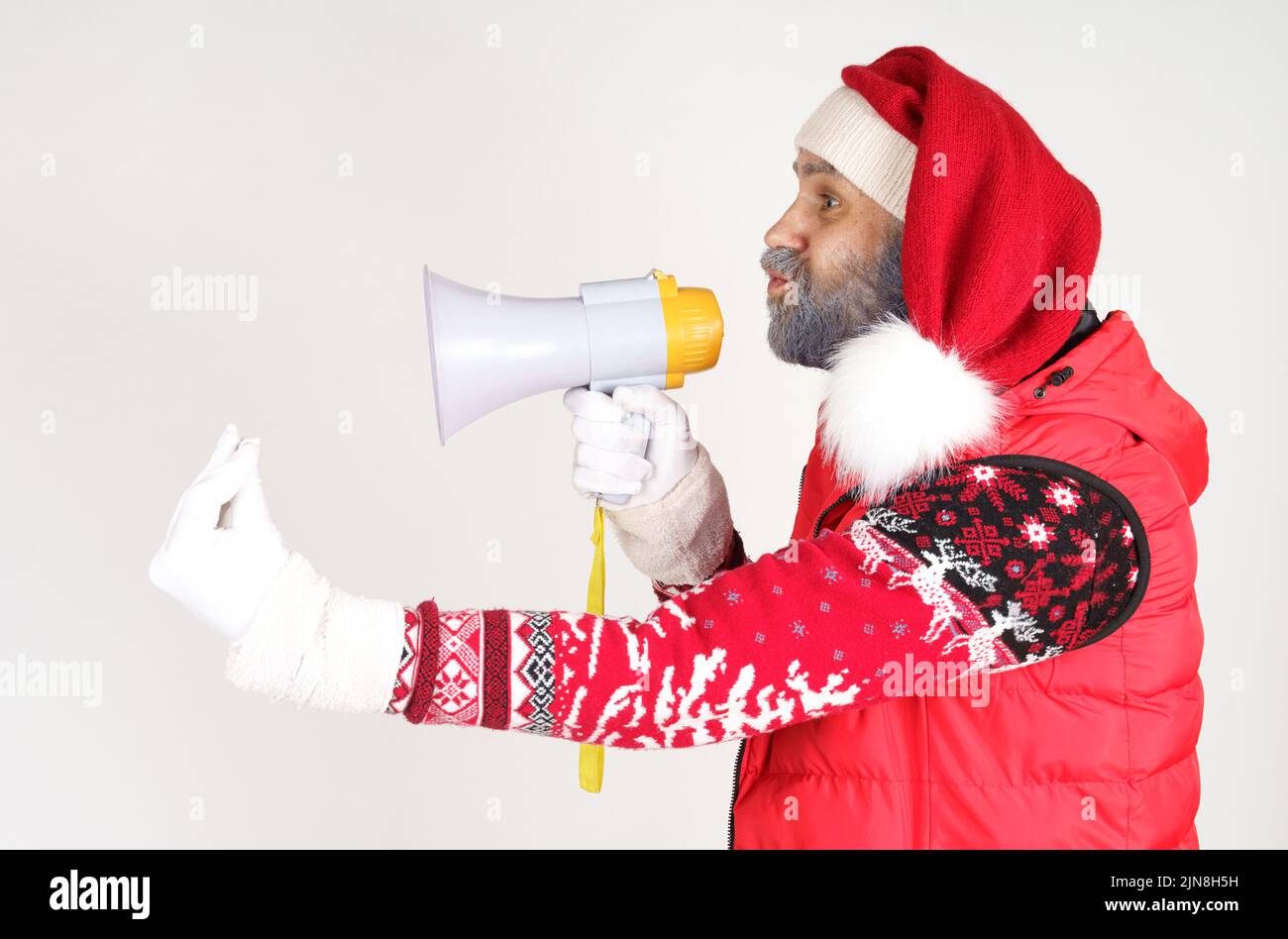 New Year and Christmas concept. Santa Claus is emotionally talking ...