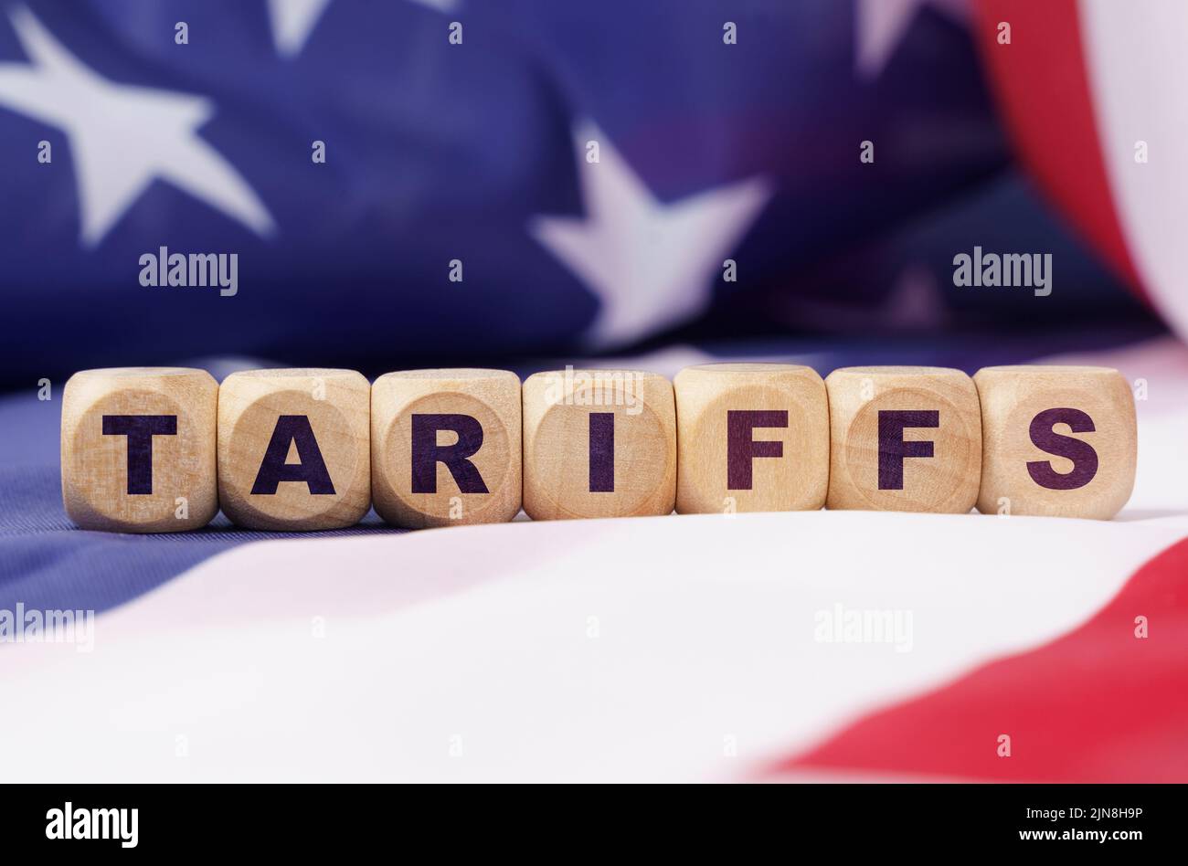 American economy and business concept. The US flag has cubes with the ...