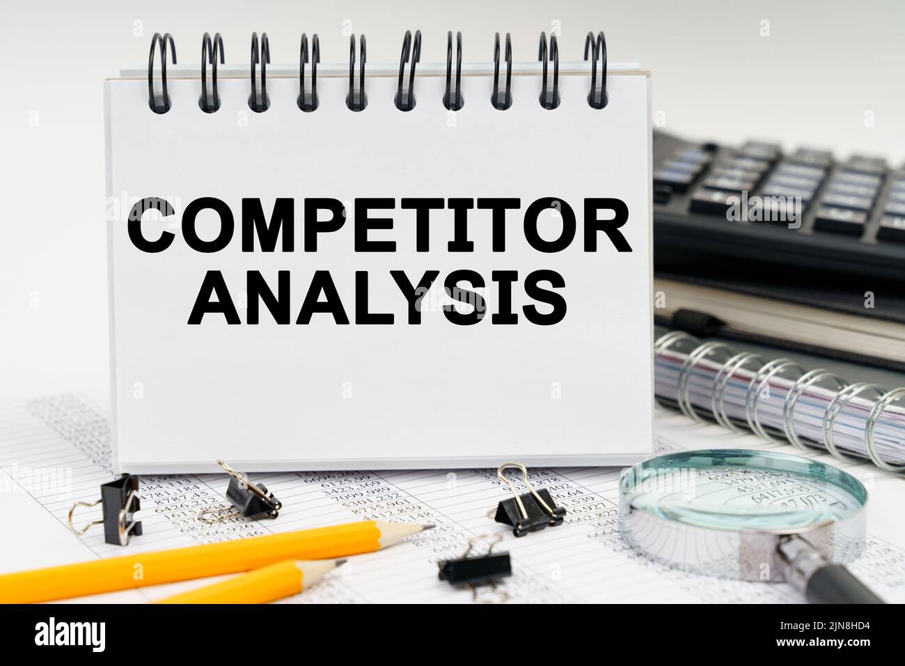 Business and economy concept. On the table is a magnifying glass ...