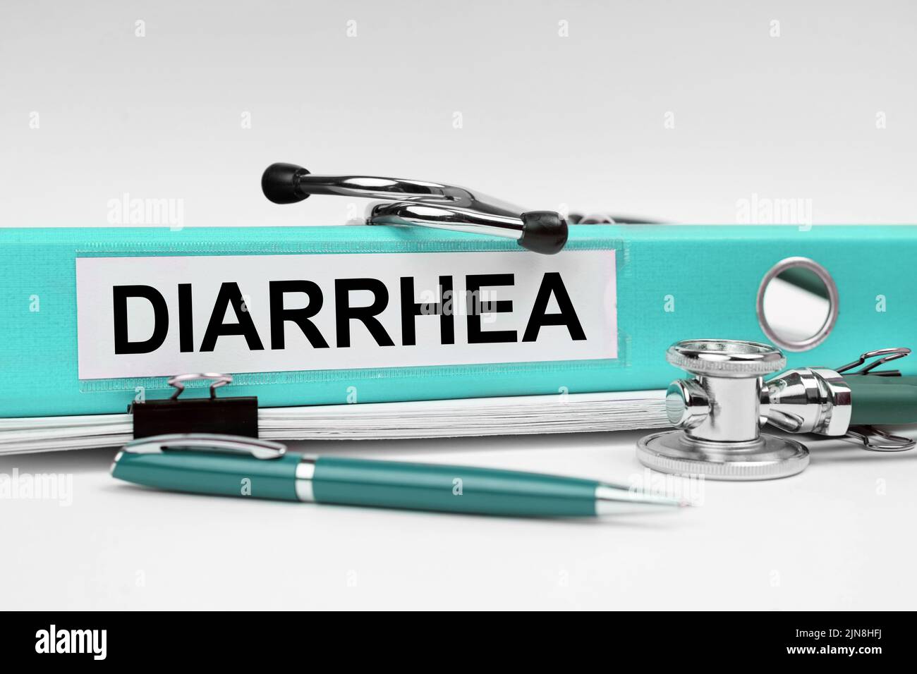 Medicine concept. On the book is a stethoscope and a folder with the ...