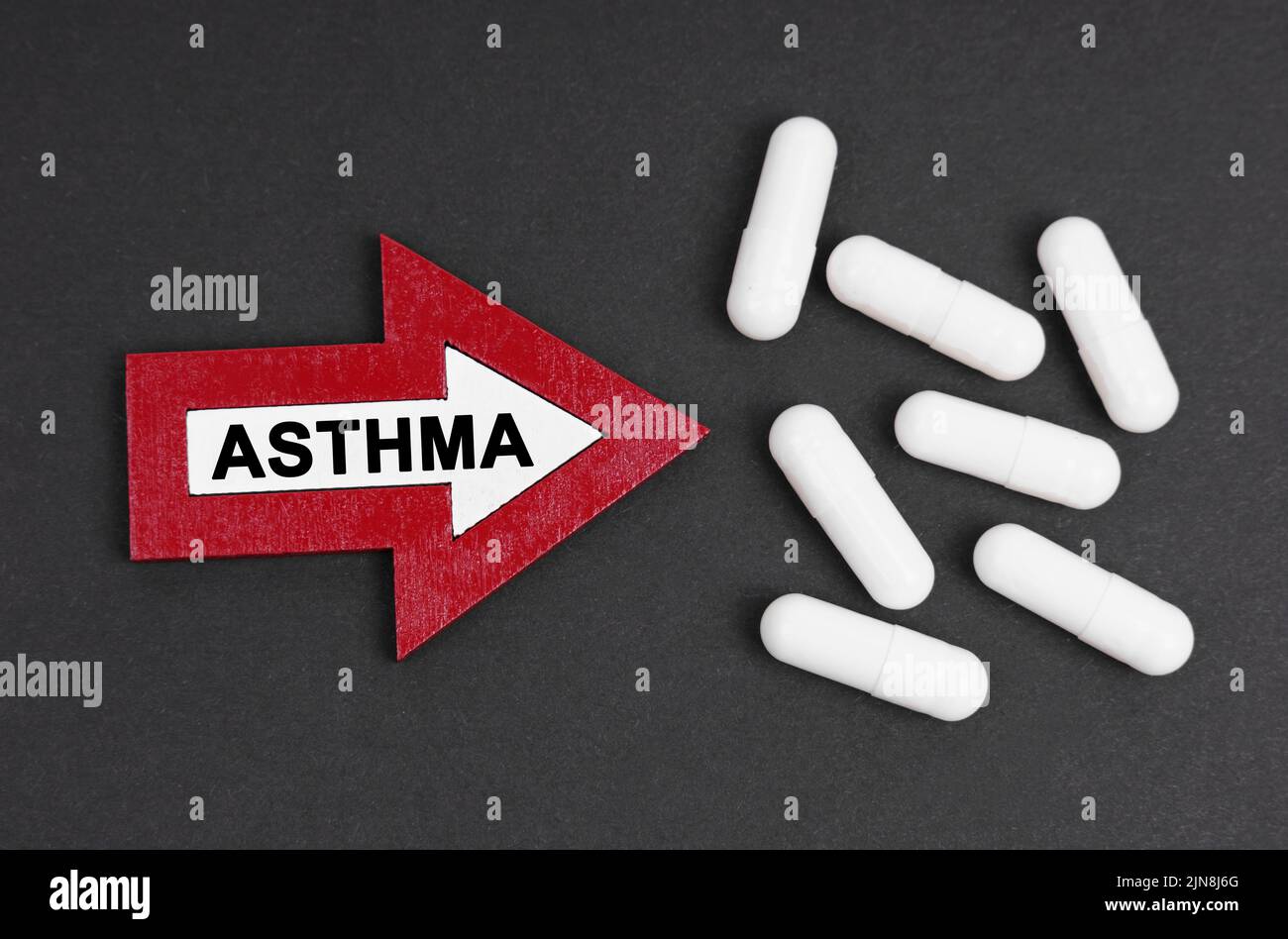 Medicine concept. Tablets are on a black background. They are indicated ...