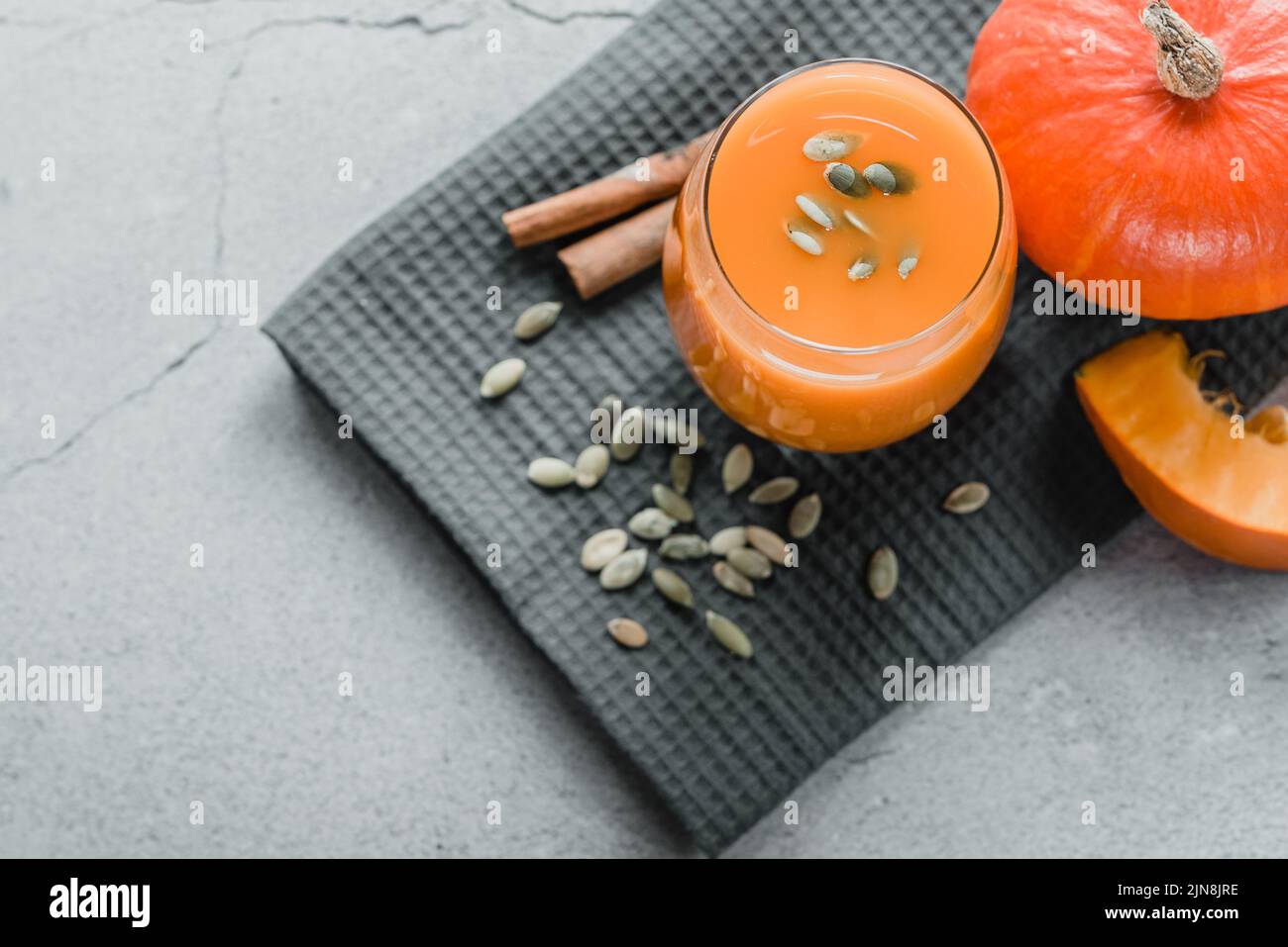 Autumn vegetable juice made of raw pumpkin Stock Photo - Alamy
