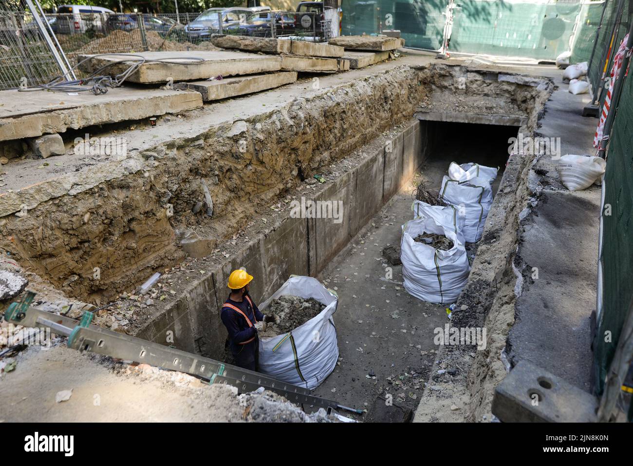 Bucharest, Romania - August 3, 2022: Asian construction worker on a ...