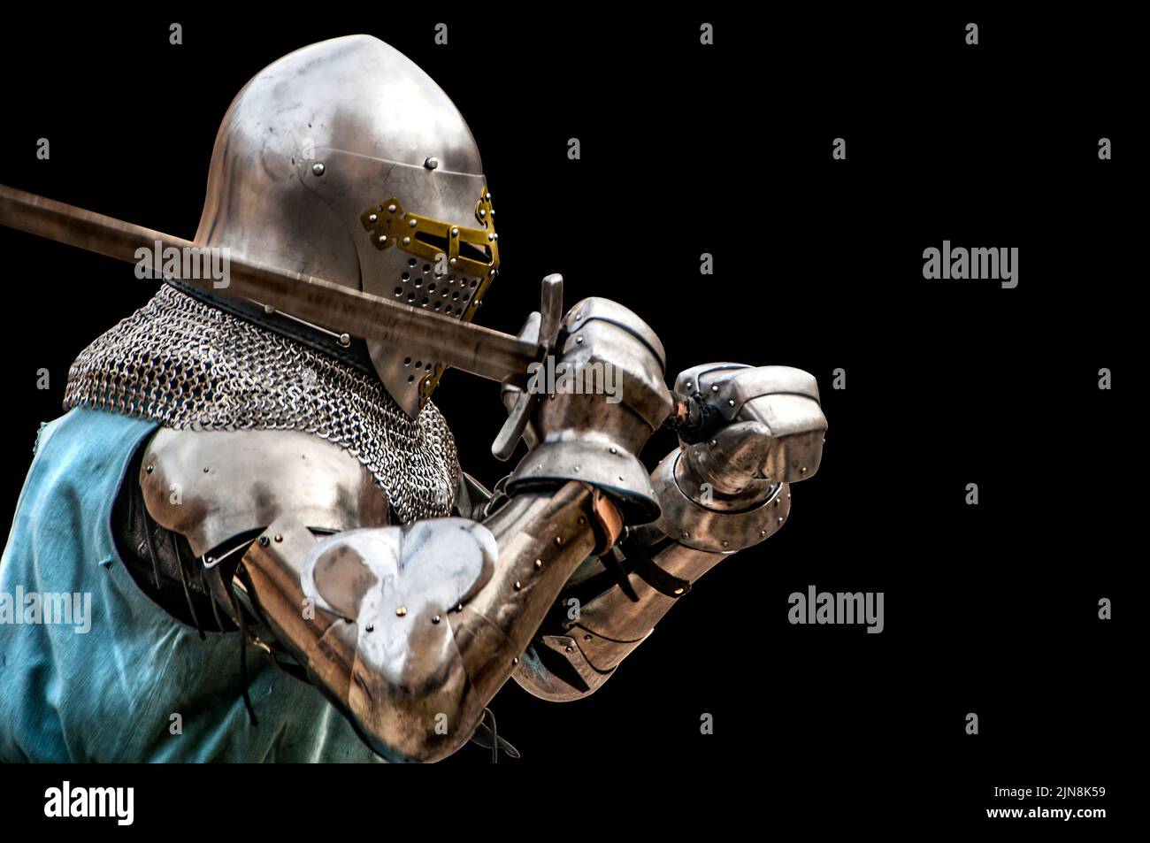 Medieval warrior fighting with a two handed sword Stock Photo - Alamy