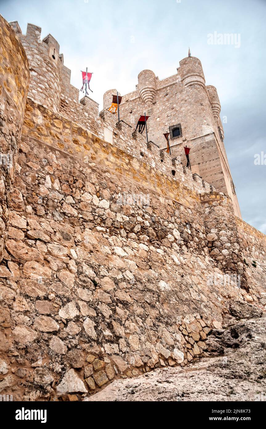 Wall of the medieval castle of Villena in Spain Stock Photo - Alamy