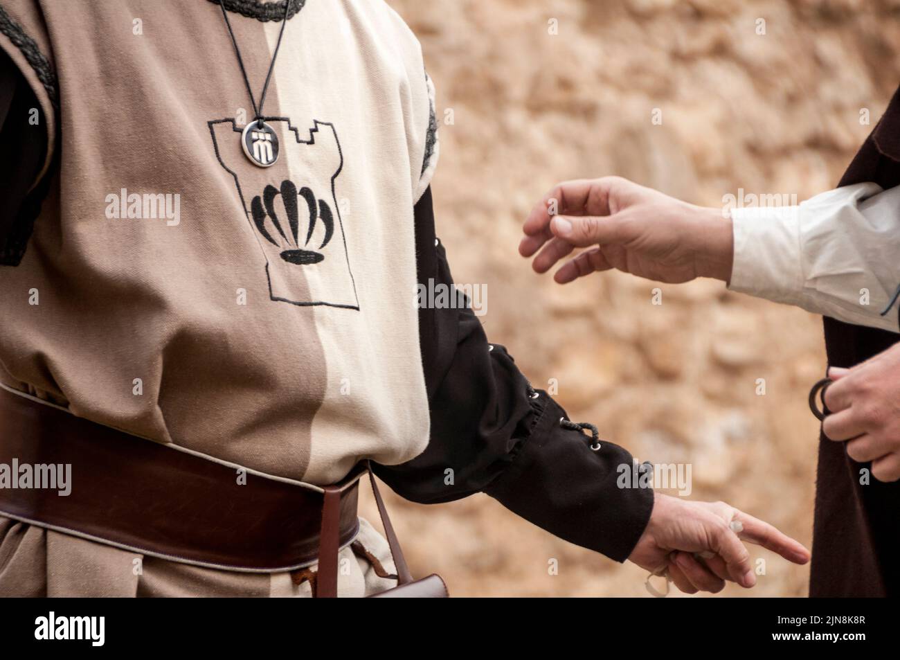 Medieval merchants negotiating deals at medieval castle Stock Photo - Alamy