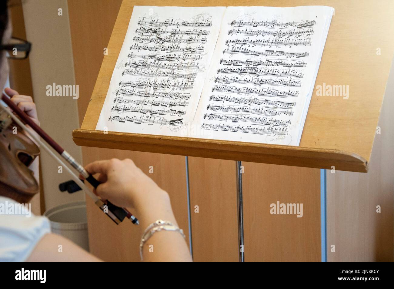 Studying classical music hi-res stock photography and images - Alamy
