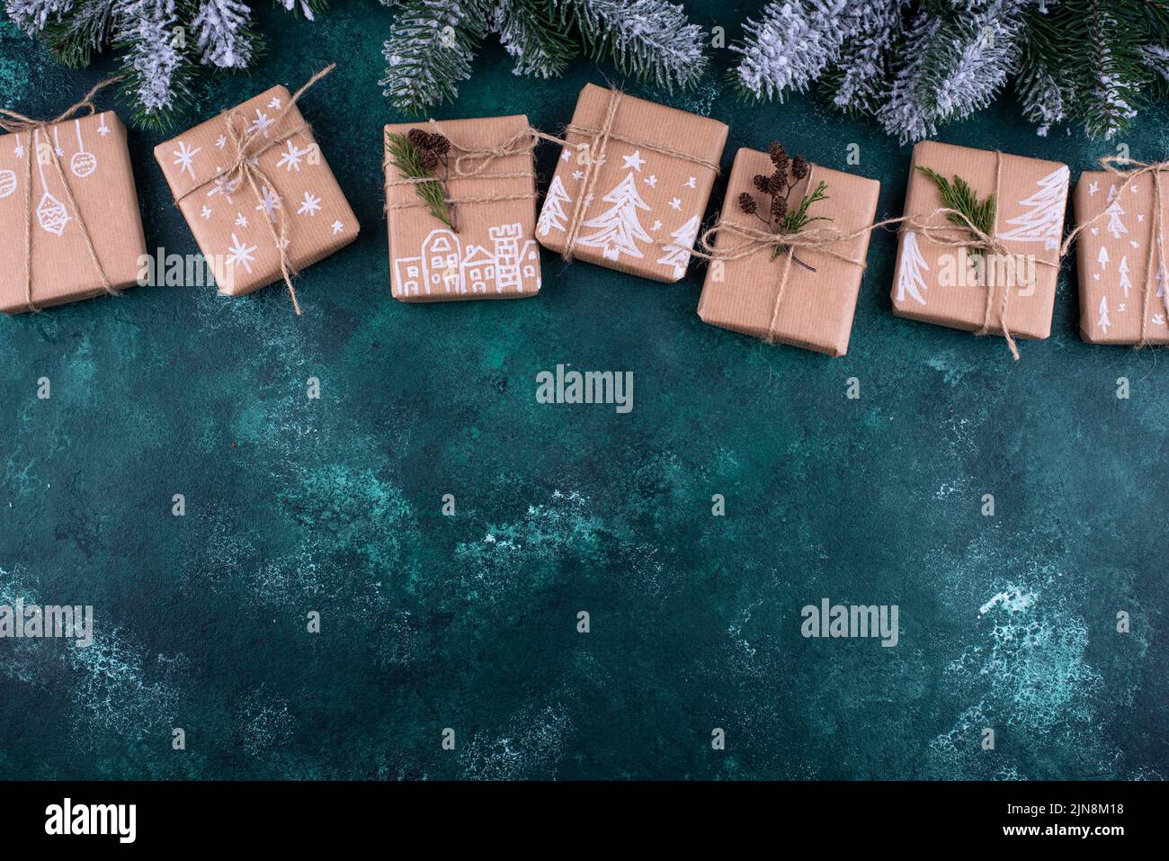 Christmas gift boxes in craft paper Stock Photo - Alamy